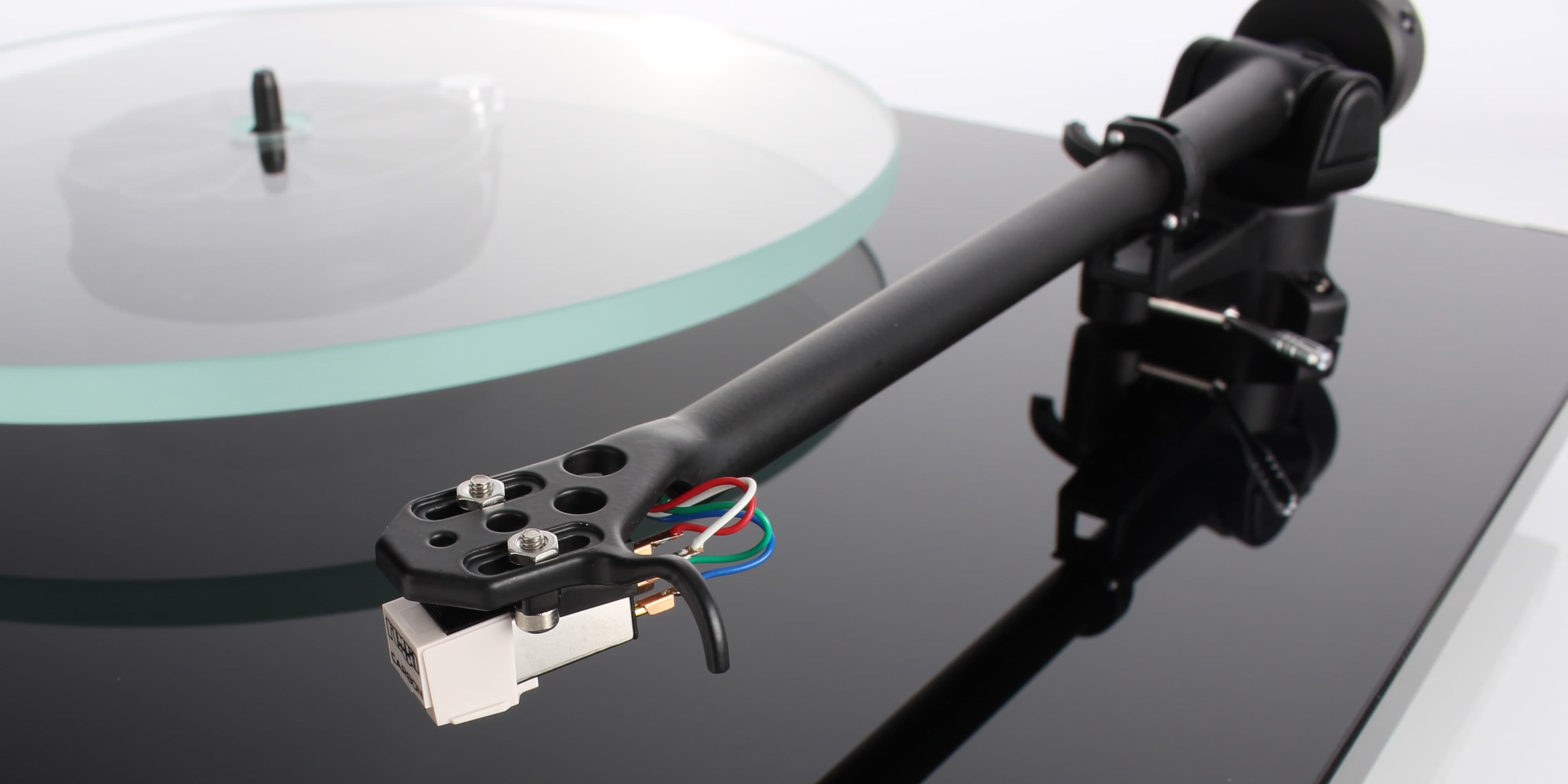 Rega RB220 precision crafted tonearm with extremely low friction levels